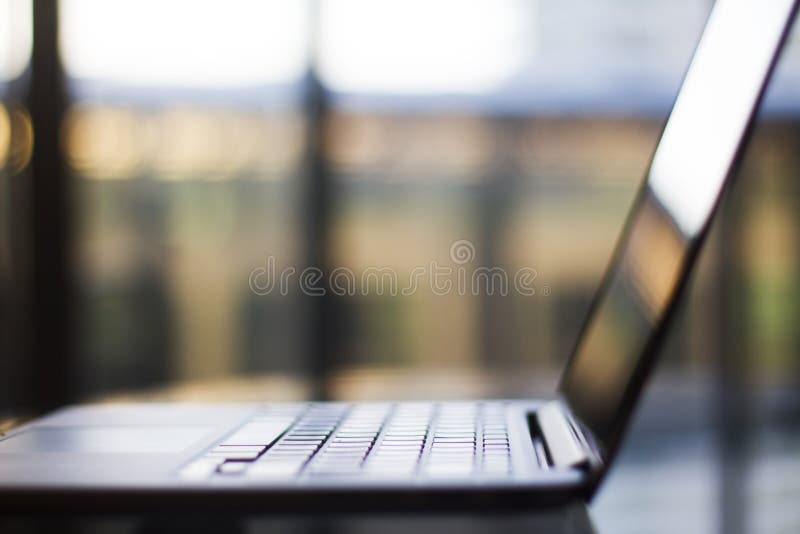 Laptop on Glass Table at Sunset Stock Photo - Image of desktop ...
