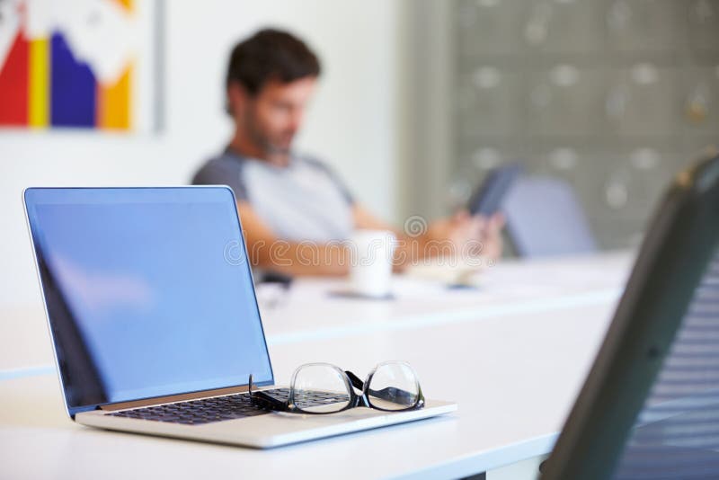 Laptop and Glasses on Desk in Design Studio Stock Image - Image of ...