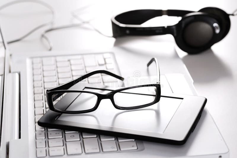 Laptop Glasses and Digital Tablet on White Stock Image - Image of adult ...