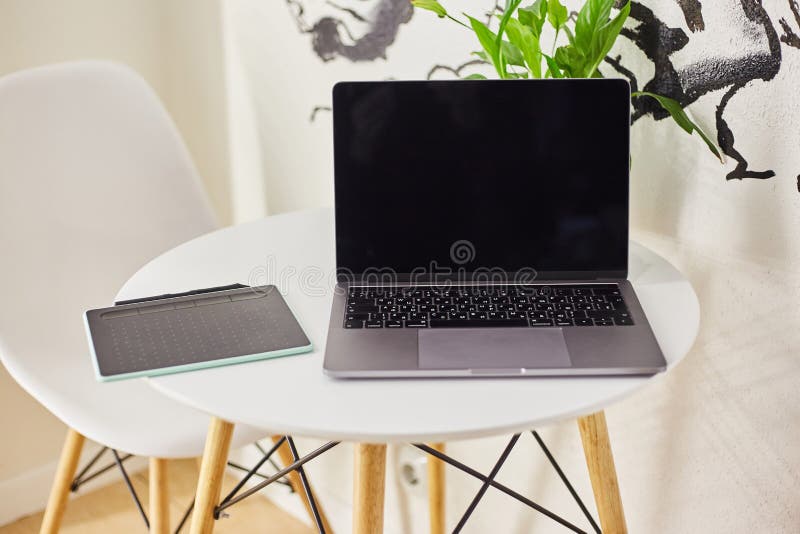 Laptop with a Graphics Tablet on a Table in a Cafe. Editorial Image ...