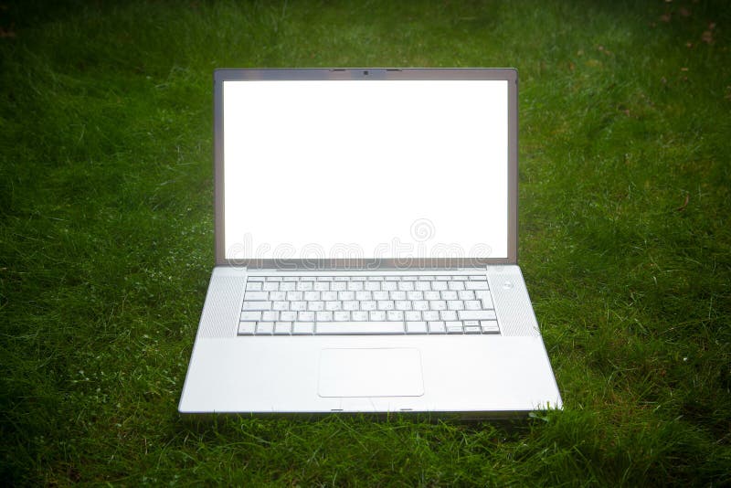 Laptop on the grass stock photo. Image of laptop, light - 22361146