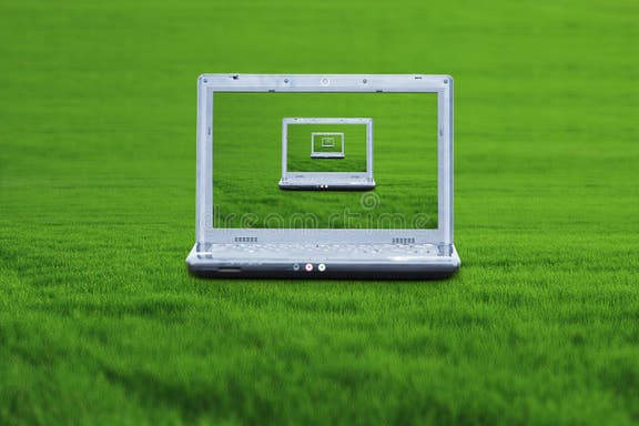 Laptop on green grass stock photo. Image of computing - 22821664
