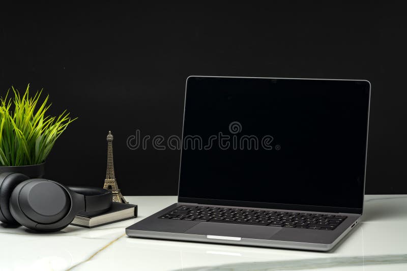 Laptop with Green Leafy Potted Plant on Black Background Stock Image ...