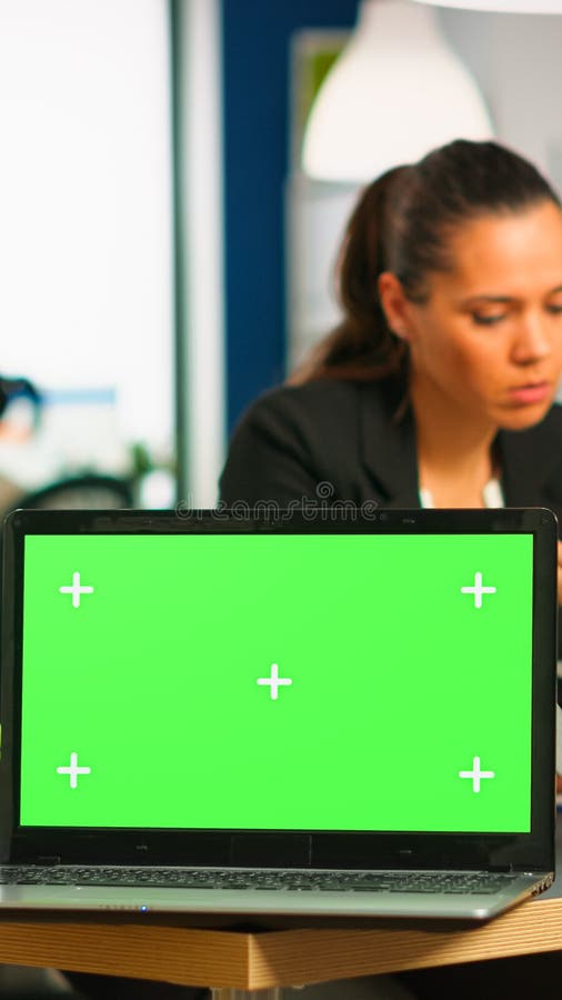 Laptop with Green Screen Ready for Presentation Placed on Desk Stock ...