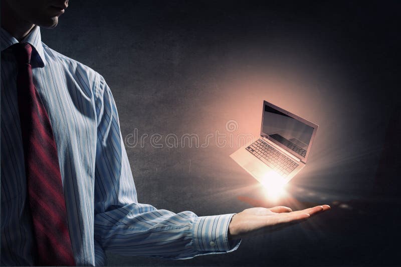 Laptop in hand stock image. Image of insurance, present - 63854141