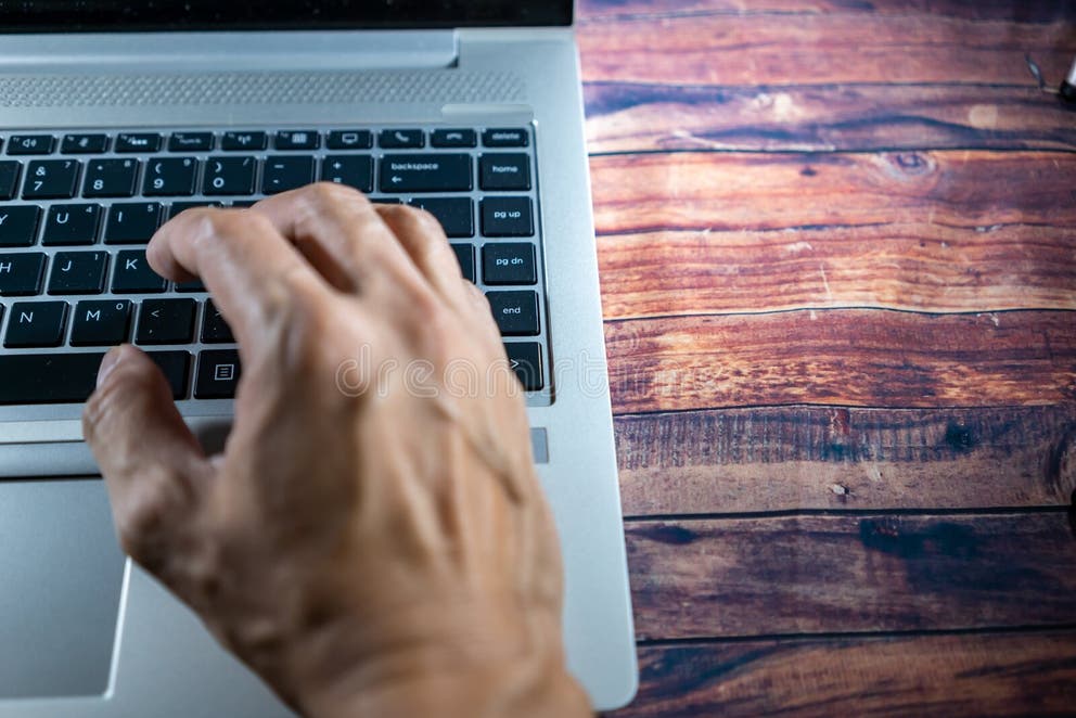 Laptop with a Hand while Typing or Encoding. Business Concept, Office ...