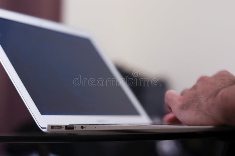 Laptop with Hands on Keyboard Side View. Copy Space. Doing it Business ...