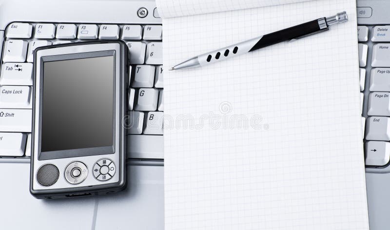 Laptop with Hi-Tech PDA and Notepad. Stock Image - Image of close ...