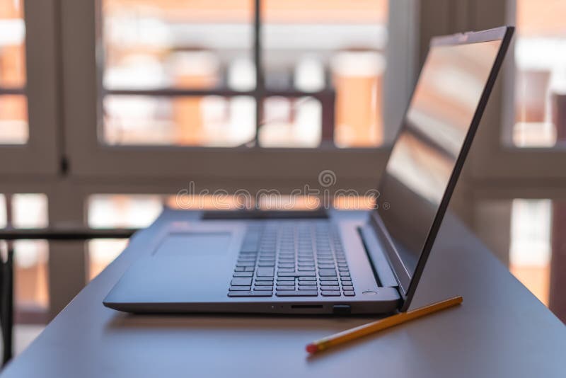 Laptop in a House with Large Windows Prepared for Teleworking. Stock ...