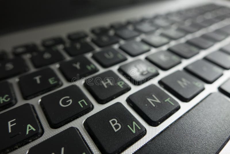 Laptop Keyboard Close-up in Two Languages: Russian and English Stock ...