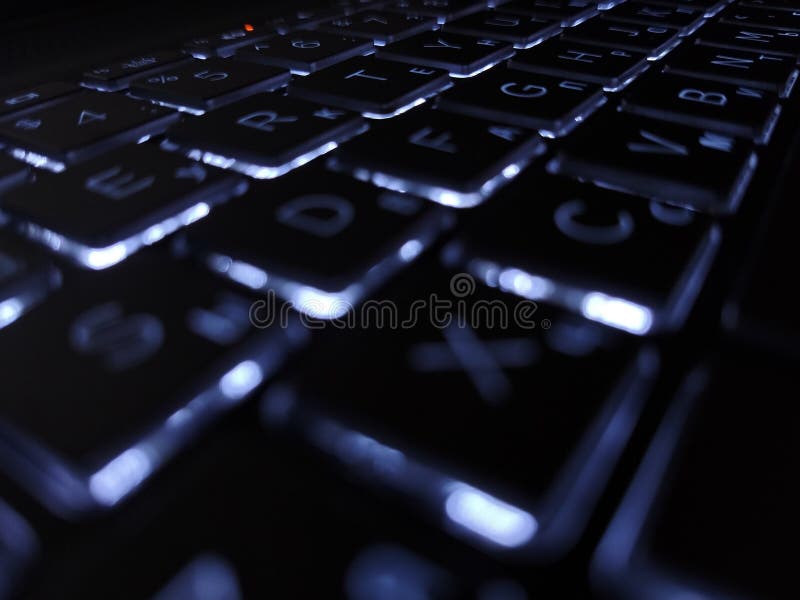 Laptop Keyboard in the Dark, Illuminated by Light Stock Photo - Image ...
