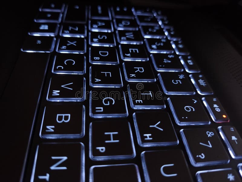 Laptop Keyboard in the Dark, Illuminated by Light Stock Image - Image ...
