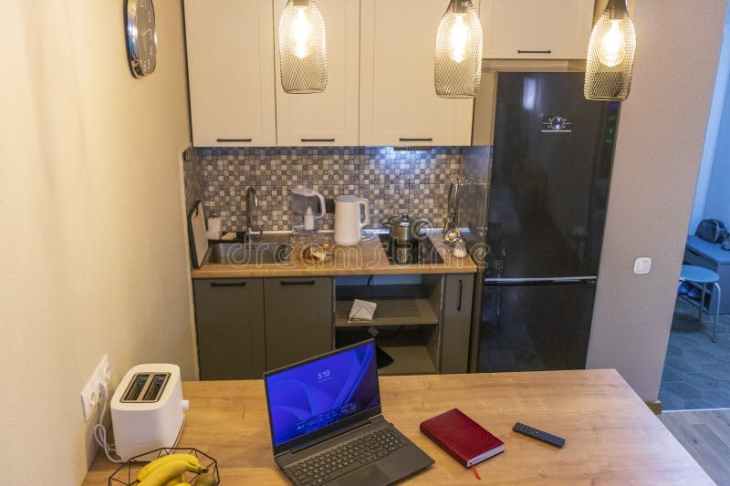 Laptop on the Kitchen Counter Top with an Excel Sheet on Computer ...