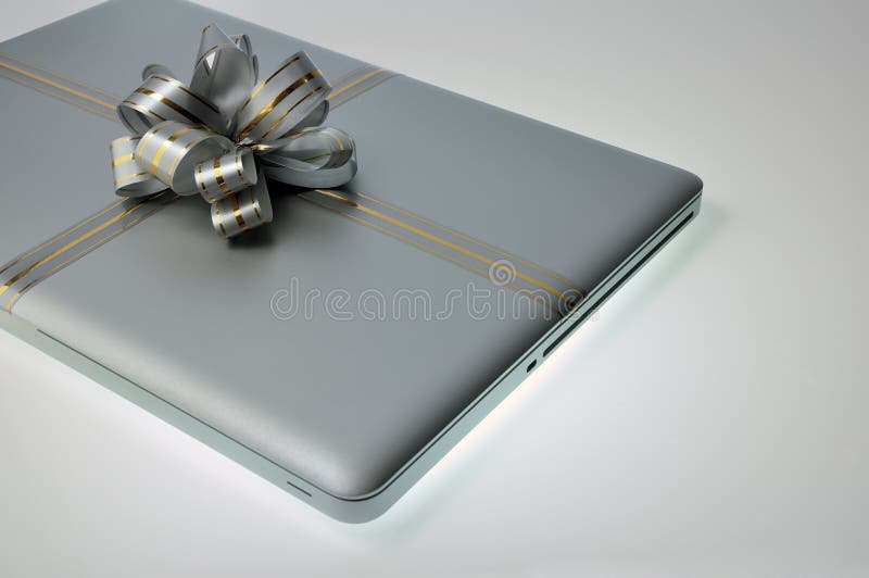 Laptop like a present stock image. Image of silver, holiday - 20389913