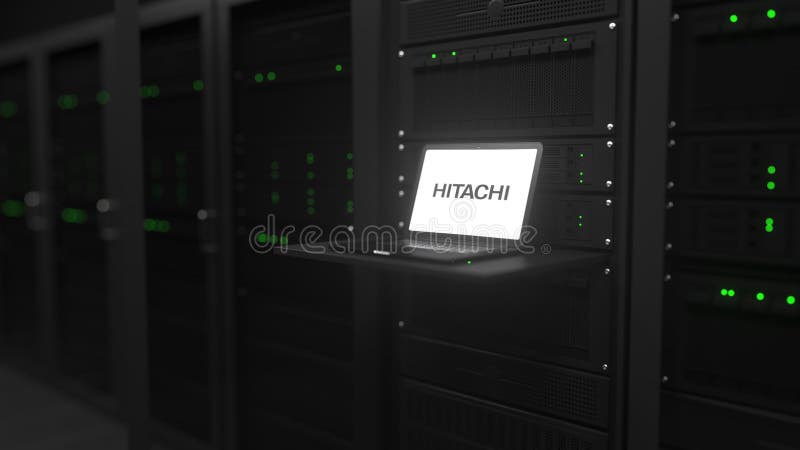 Laptop with the Logo of HITACHI on the Screen in a Server Room ...