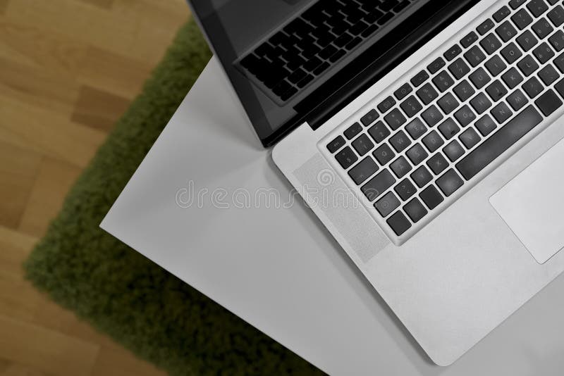 Laptop MacBook Pro Lying on the Table Stock Photo - Image of notebook ...
