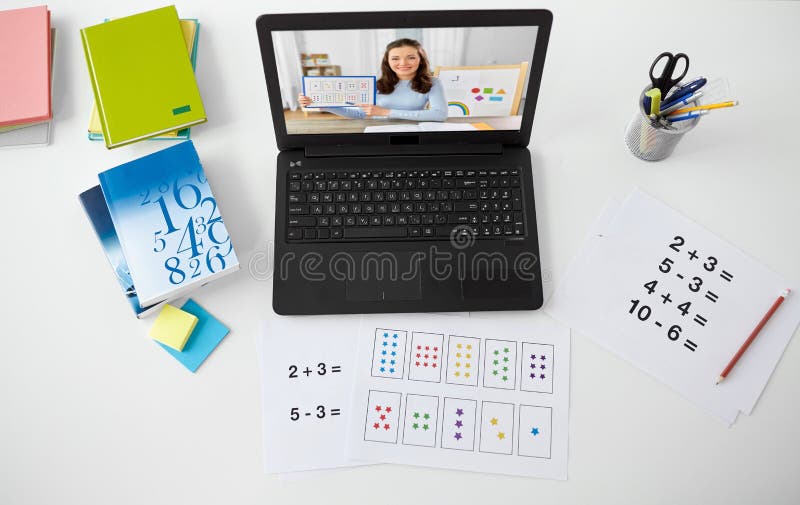 Laptop, Math Study Guides and Book on Table Stock Photo - Image of desk ...