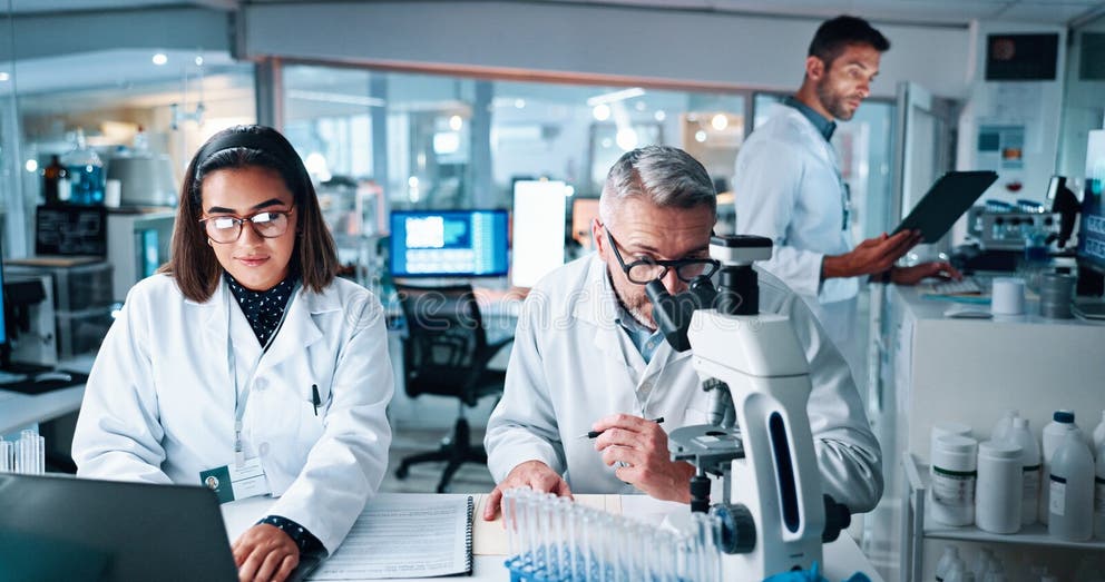 Laptop, Microscope and Science with People in Laboratory Together for ...