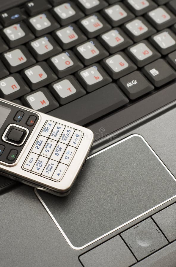 Laptop and mobile phone stock image. Image of message - 3865969