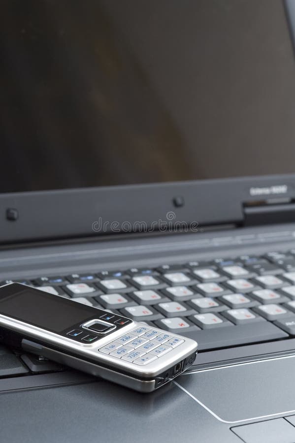 Laptop and mobile phone stock image. Image of professional - 3866257