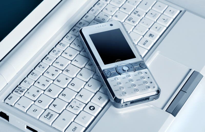 Laptop and Mobile Phone stock image. Image of professional - 6048535