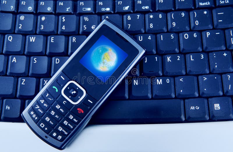 Laptop with Mobile Phone stock photo. Image of multimedia - 6071808