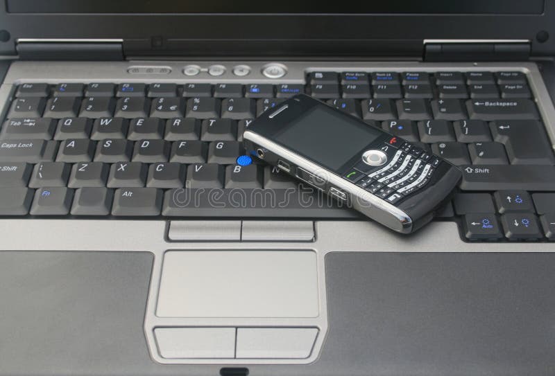 Laptop and mobile phone stock photo. Image of personal - 6106404