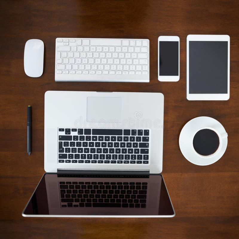 Laptop, Mobile and Tablet in High Angle Shot of Digital Devices in ...
