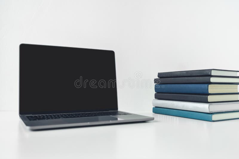 Laptop Mock Up with Blank or Empty Screen with Book or Textbook Stack ...