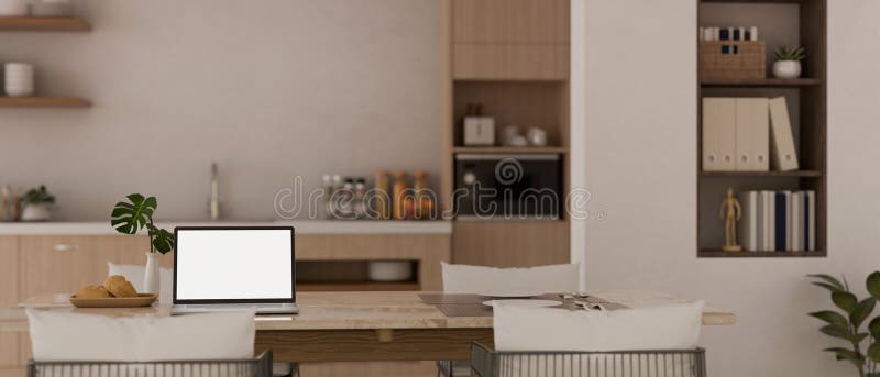 A Laptop Mockup on a Dining Table in a Modern Contemporary Kitchen ...