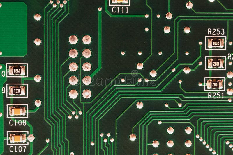 A Microprocessor Soldered Into A Green Motherboard Stock Photo - Image ...