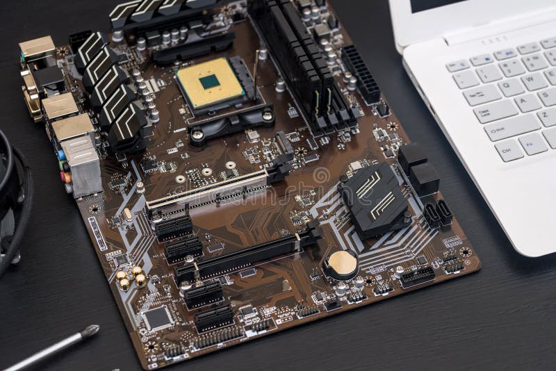 Laptop with Motherboard on Wooden Table Closeup Stock Image - Image of ...