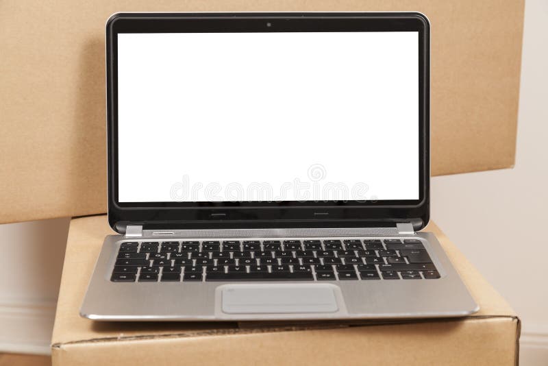 Laptop and moving box stock photo. Image of move, internet - 65663834