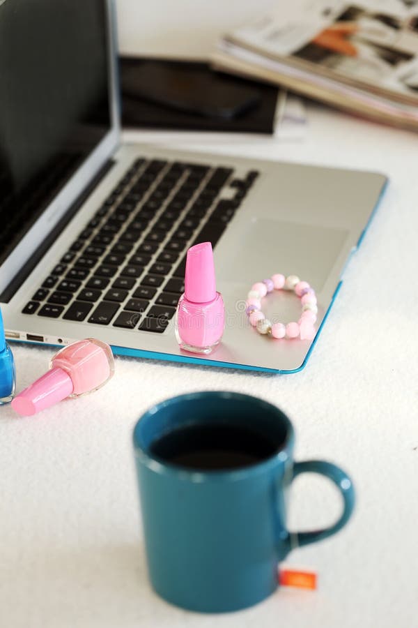 Laptop, Mug and Nail Polish Stock Image - Image of home, blue: 37911895