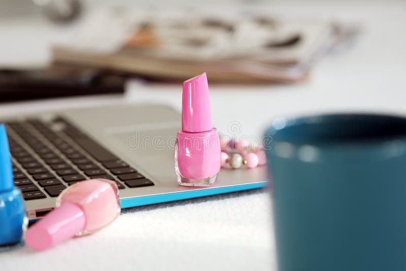 Laptop, Mug and Nail Polish Stock Image - Image of home, blue: 37911895