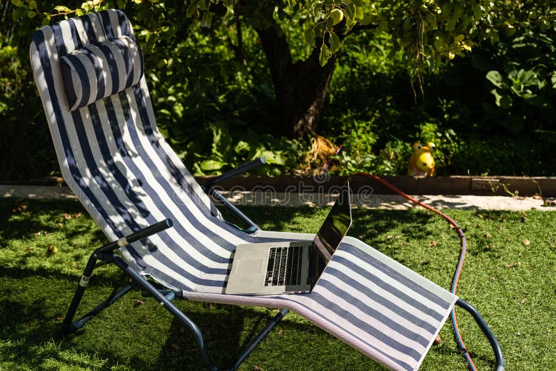 Laptop on Nature, Laptop in the Garden. Editorial Stock Photo - Image ...