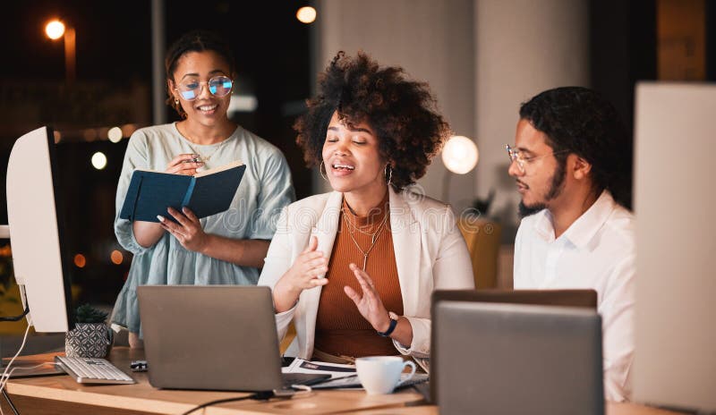 Laptop, Night and Team in Discussion in the Office for a Creative ...