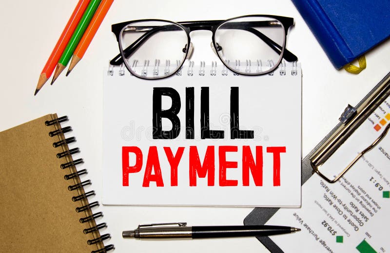 Laptop, Notebook with Magnifying Glass on Wooden Table with Text Bill ...