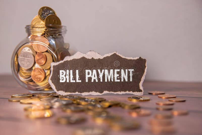 Laptop, Notebook with Magnifying Glass on Wooden Table with Text Bill ...