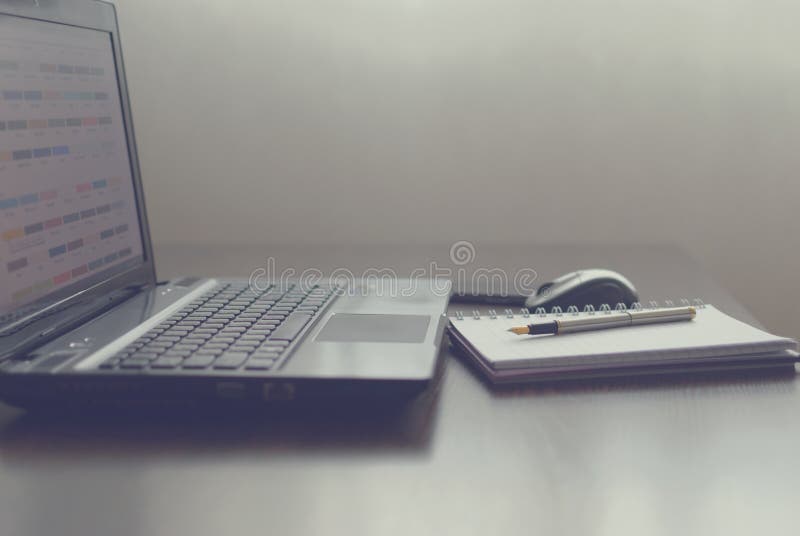 Laptop, notebook and pen stock image. Image of smart - 63123125