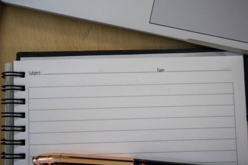A Laptop and a Notebook Side by Side Stock Photo - Image of hands ...