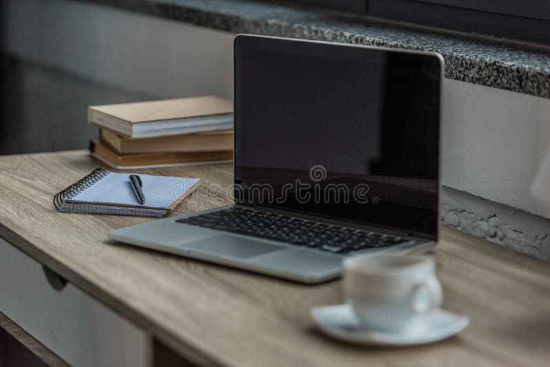 Laptop and Notebook on Table Stock Image - Image of gadget, table ...