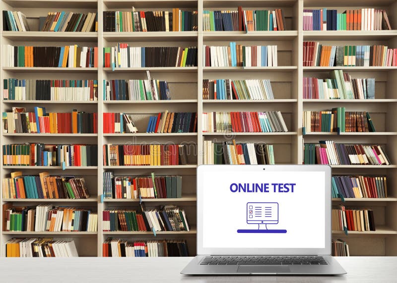 Laptop with Online Test on Screen in Library Stock Image - Image of ...