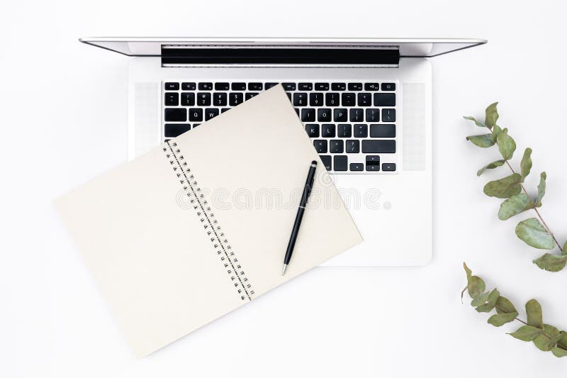 Laptop and Open Blank Notepad on White Background, Top View. Stock ...