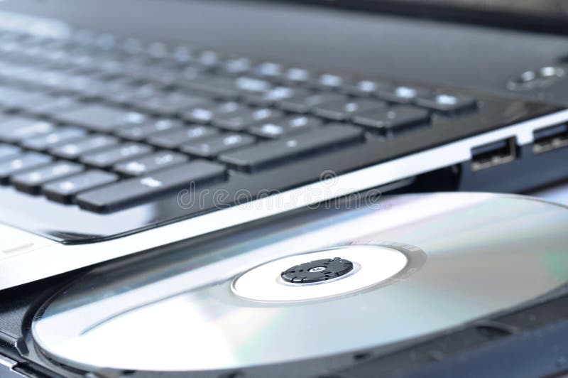 Laptop with open CD drive stock image. Image of keyboard - 27874509