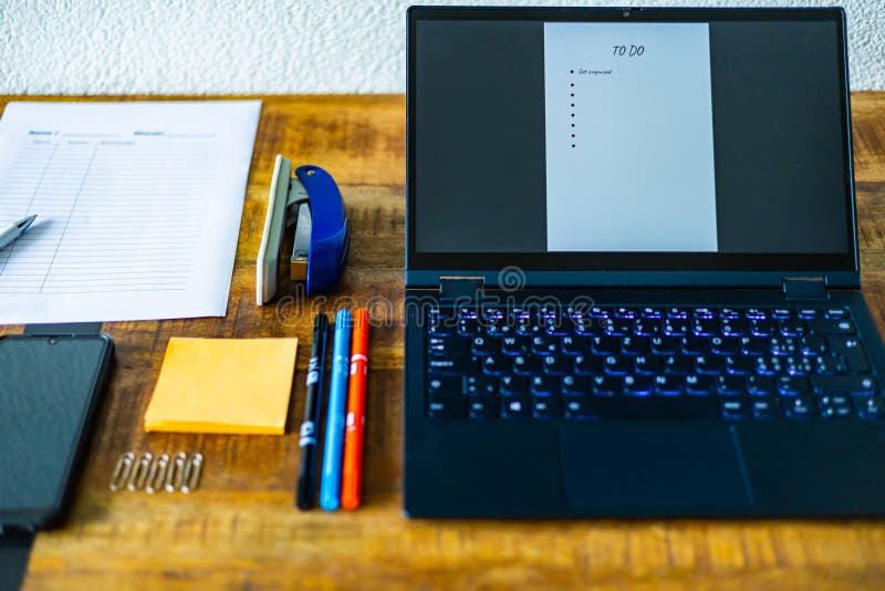 A Laptop is Open on a Wooden Desk. Stock Image - Image of desk ...