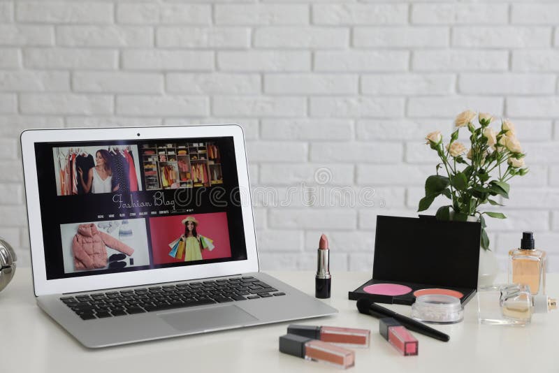 Laptop with Open Fashion Blogger Site on Table Stock Image - Image of ...