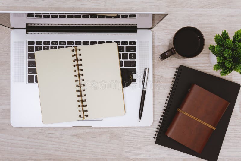 Laptop, Open Notebook and Coffee Mug on Table Stock Image - Image of ...