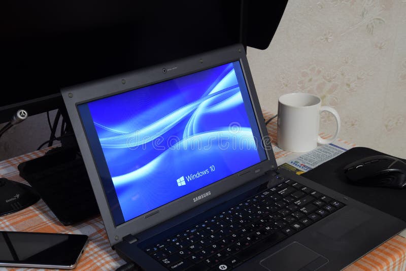 Laptop with the Operating System Logo Displayed on the Screen Windows ... Laptop with the Operating System Logo Displayed on the Screen Windows ...
