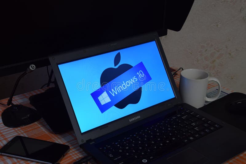 Laptop with the Operating System Logo Displayed on the Screen Windows ... Laptop with the Operating System Logo Displayed on the Screen Windows ...